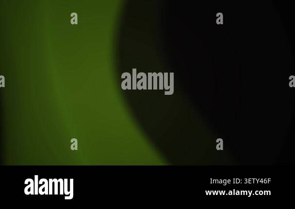 Blurry green background with a purple spot Stock Video Footage - Alamy