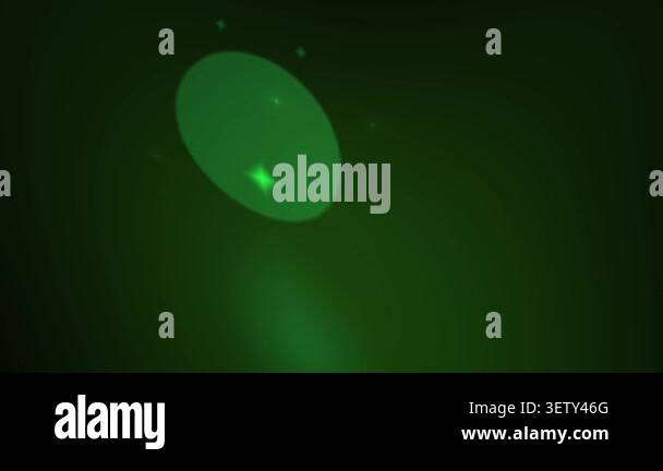 A green glowing orb shines brightly against a dark background with ...