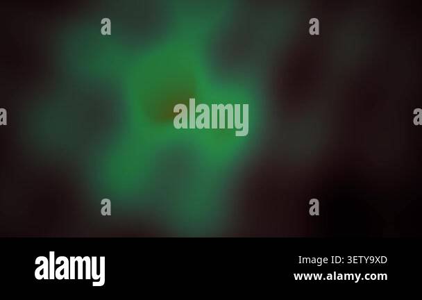 Microscopic view of green glowing cells on a dark background Stock ...