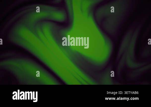 Close-up of green neon light forming abstract shapes on a dark ...