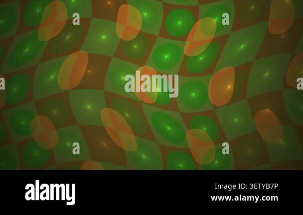 Glowing green and orange cells under microscope Stock Video Footage - Alamy