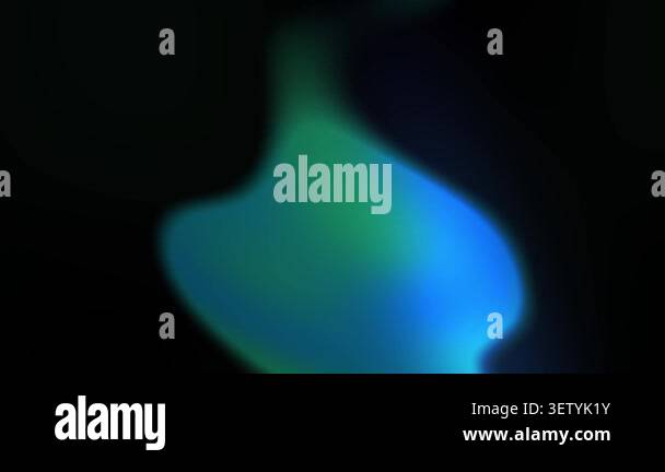 Blurry glowing blue and green abstract shapes on a black background ...