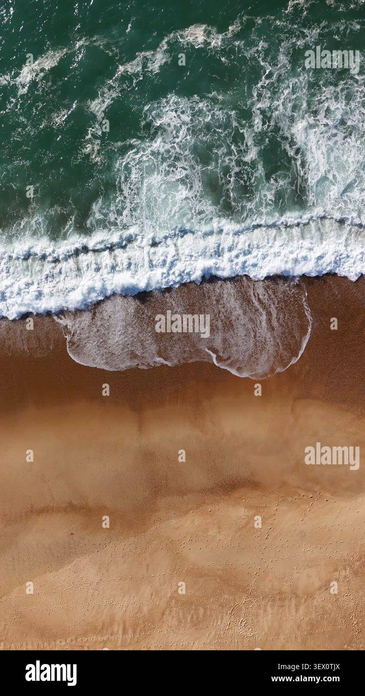 Aerial View Of Ocean Waves Crashing Onto Sandy Beach Stock Video ...