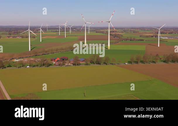 A high-angle aerial drone photograph capturing a vast countryside ...