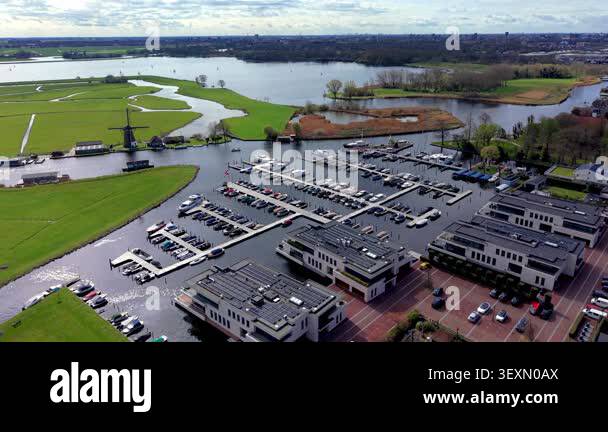 A high-angle aerial drone photograph showcasing a modern, luxurious ...