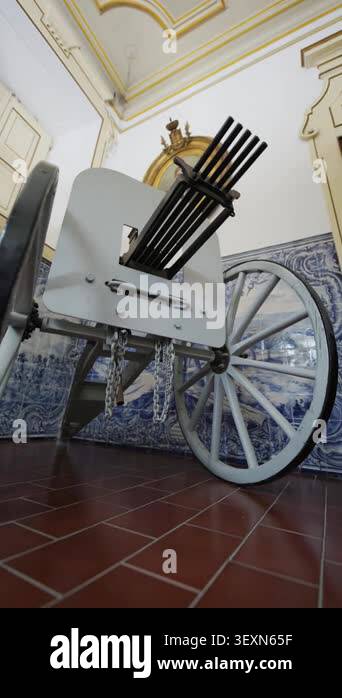 Old military artillery piece with multiple barrels exhibited inside a ...
