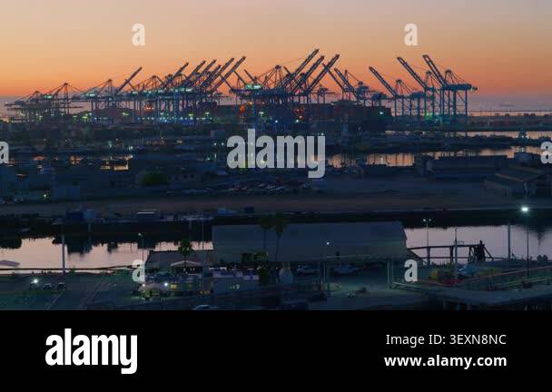 Industrial container port terminal cranes silhouettes at sunrise Stock ...