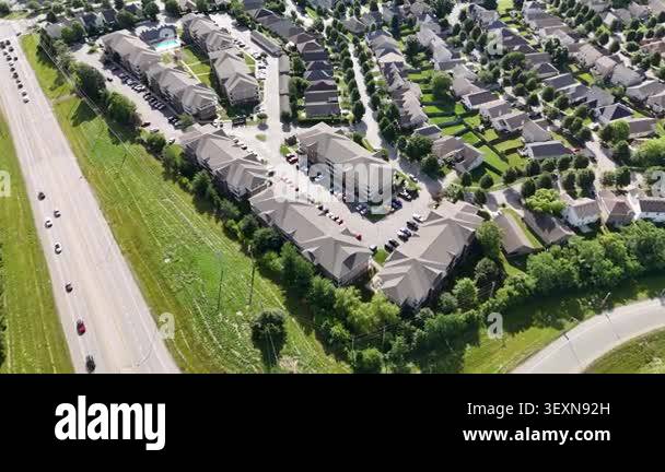 aerial view of a modern city with a lot of buildings in a sunny day ...