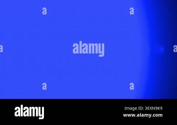 Glowing blue circular light lens flare perfect for backgrounds ...
