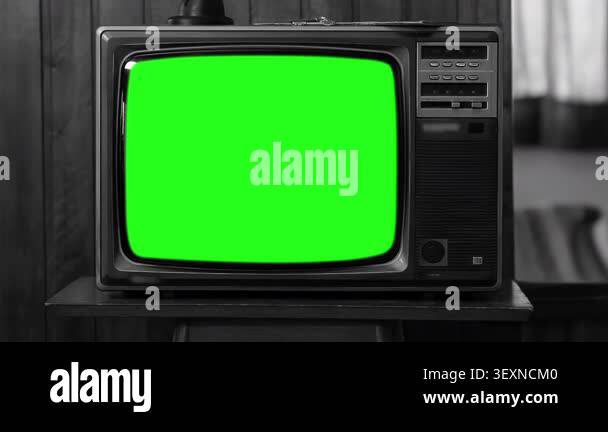 Vintage Television Box with Bright Green Screen Display in Black and ...