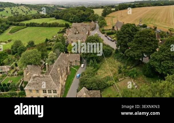 Aerial perspective revealing a historic stone village nestled in the ...