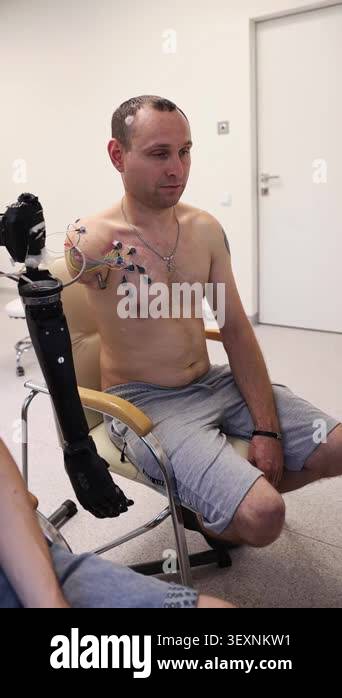 Man with Bilateral Leg Prosthetics Training in Rehabilitation Center ...