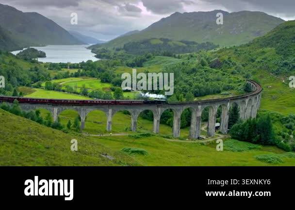 Famous Jacobite steam train travels over the Glenfinnan Viaduct in the ...