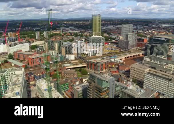 Aerial view from above a modern city with ongoing construction and ...
