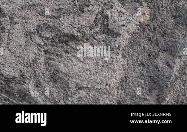 Close-up of natural granite rock surface with swirling patterns Stock ...