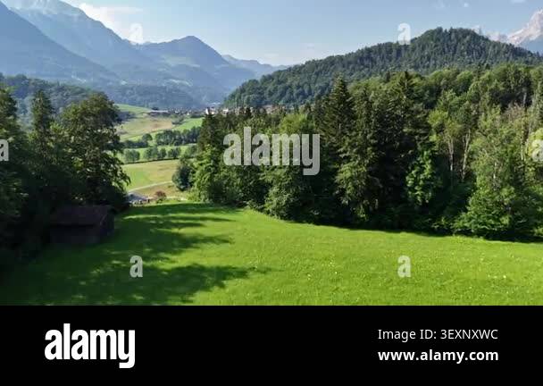 Picturesque summer landscape with a mountain village in the valley of ...