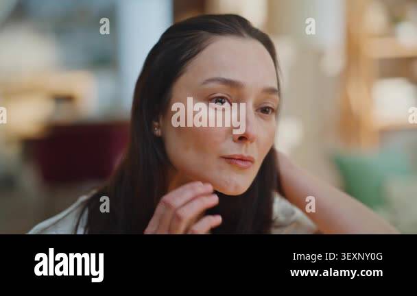 Closeup lady examining face wrinkles age-related changes looking home ...