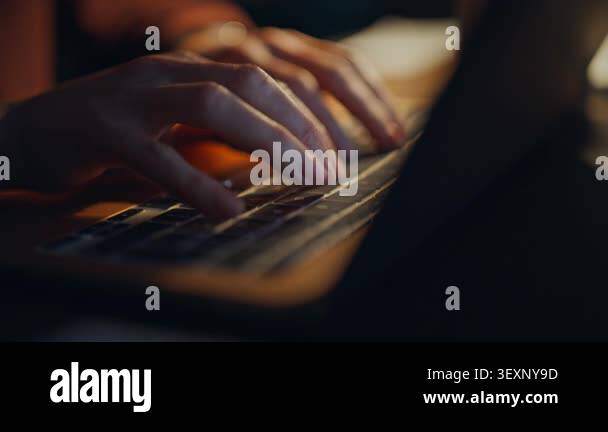 Night hands typing laptop closeup. Busy manager person pressing buttons ...