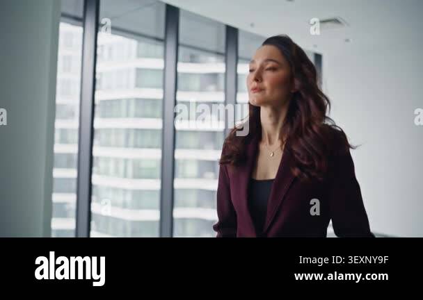 Closeup businesswoman walking hall modern center. Joyful elegant woman ...