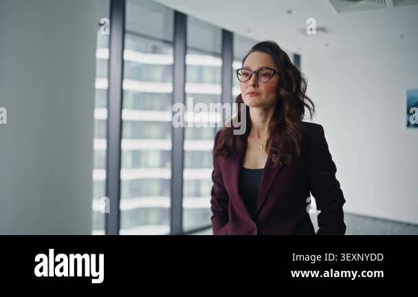 Closeup proud businesswoman walking hall modern center. Elegant woman ...
