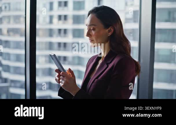 Closeup rich lawyer texting smartphone answering clients at panoramic ...