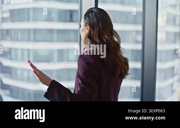 Emotional manager talking smartphone at work standing office center ...