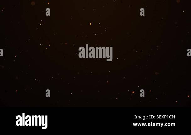 Golden sparkle particles floating on dark background for festive events ...