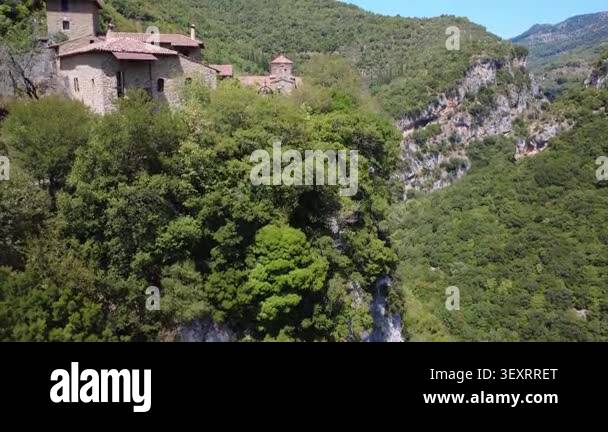 The historic Orthodox monastery stands on the edge of steep cliffs ...