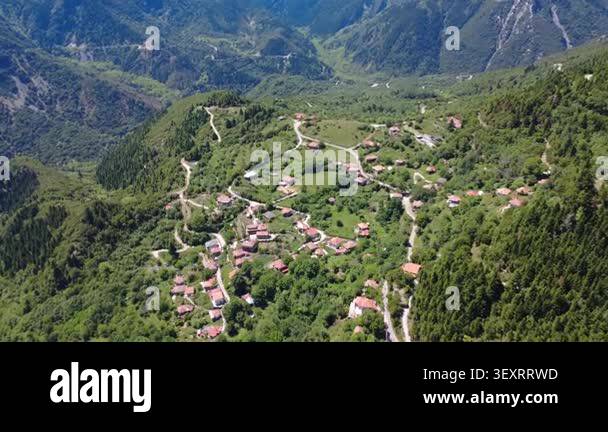 Aerial wide angle shot of a traditional mountain community featuring ...