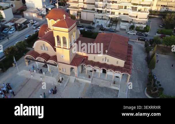 Aerial shot featuring the facade and bell tower of a Greek Orthodox ...