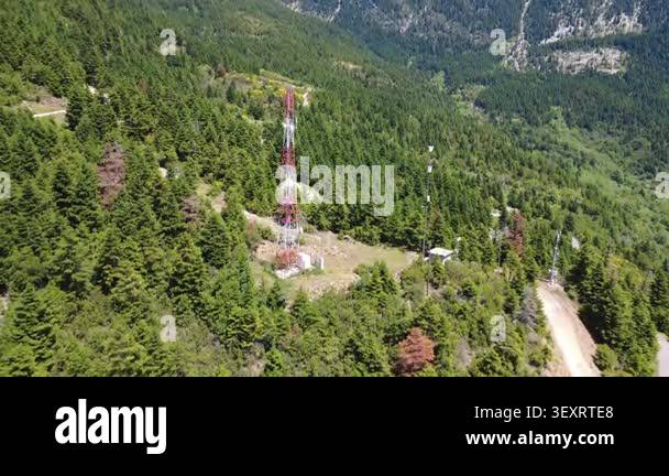 Aerial shot showing a cellular antenna, technical infrastructure and ...
