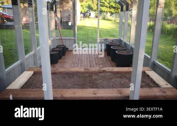 Interior view shows painted wood frame, clear tempered glass, raised ...