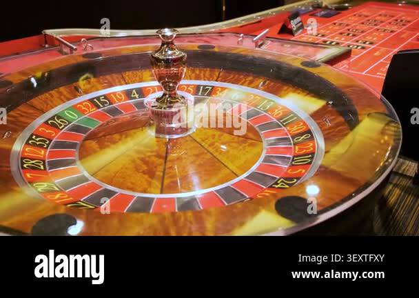 Shanghai, China - May 10, 2026: Roulette wheel and gaming tables inside ...
