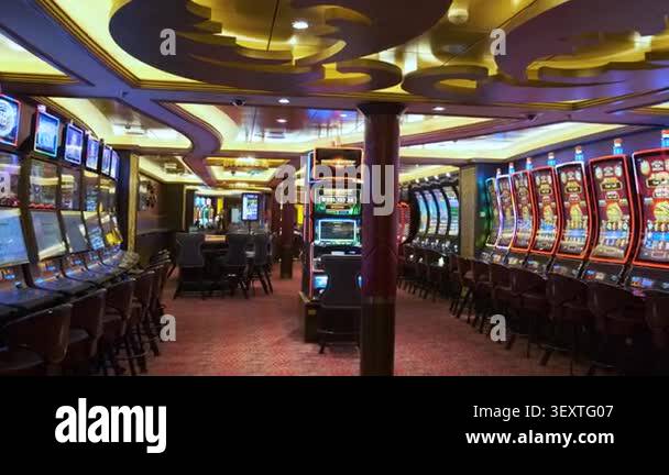 Shanghai, China - May 10, 2026: Modern slot machines with illuminated ...