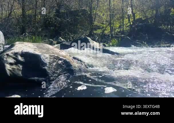 water flowing in the river, relaxed water background, moving water in ...