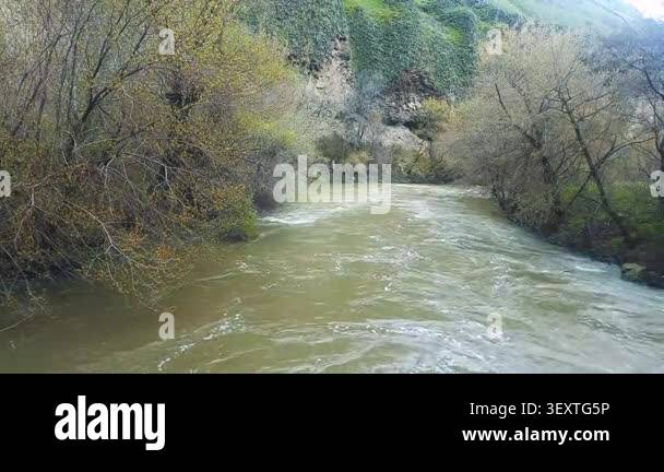 water flowing in the river, relaxed water background, moving water in ...