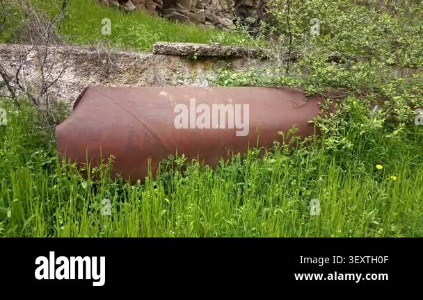 abandoned rusted metal in the nature Stock Video Footage - Alamy