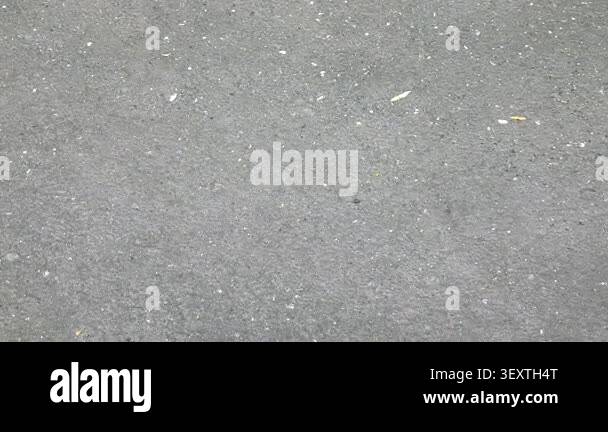 close up of a wet asphalt background, asphalt backdrop Stock Video ...