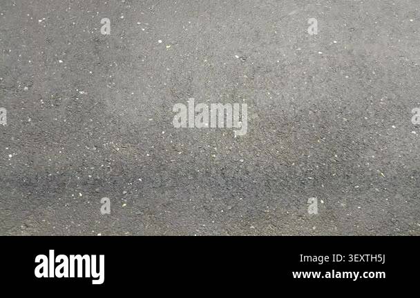 close up of a wet asphalt background, asphalt backdrop Stock Video ...