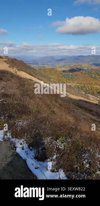 view from a mountain peak to the top, the first snow, the first snow ...