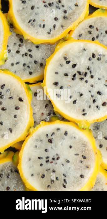 Full frame pattern of fresh sliced yellow pitahaya Stock Video Footage ...