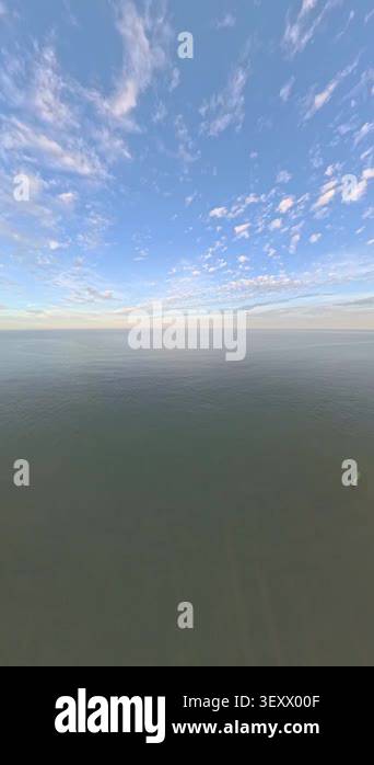 Vertical HD Aerial Drone Footage of Calm Open Ocean at Dusk for Mobile ...