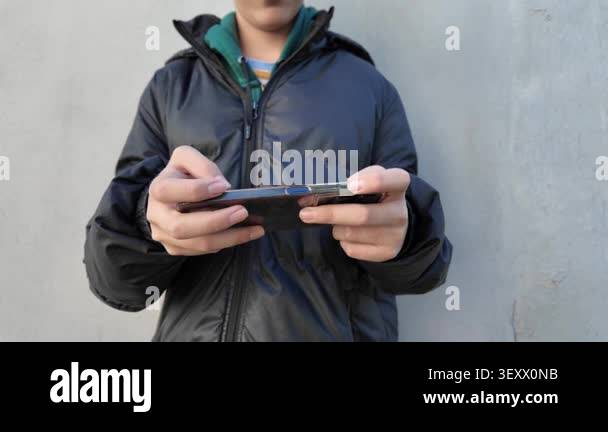 Anxious teenager using a smartphone. Screen addiction. Student life and ...