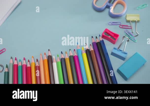 School Supplies Arranged Around an Open Squared Notebook with Large ...