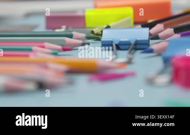 Close-Up of Colorful School Supplies with Colored Pencils, Binder Clips ...