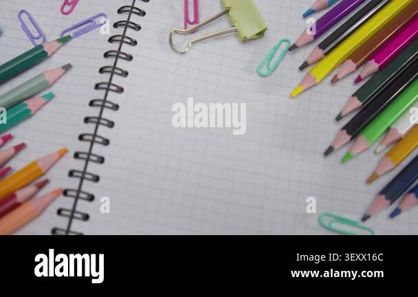 Flat Lay of Colorful School Supplies Surrounding an Open Exercise Book ...