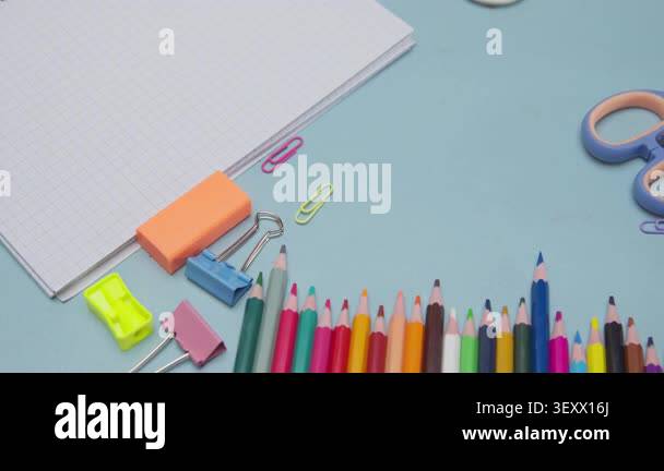 School Supplies Border with Colored Pencils, Notebook, and Stationery ...