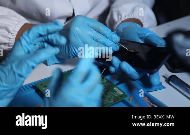 technician repairing computer with a smartphone Stock Video Footage - Alamy