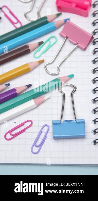 Colorful Back to School Supplies Arranged Around an Open Exercise Book ...