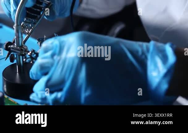 close up of the hands of man repairing a computer Stock Video Footage ...